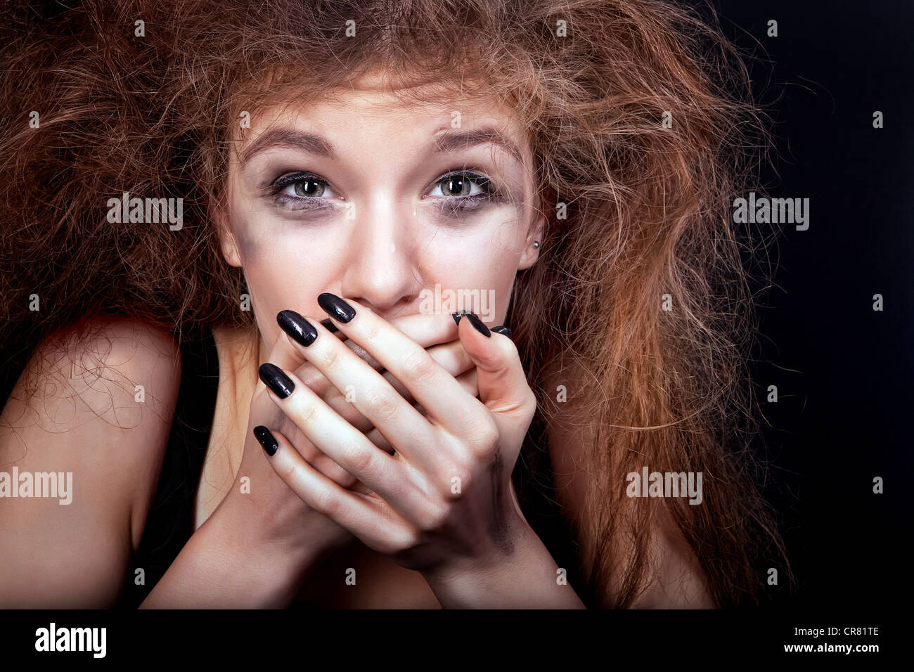 Frightened teenage girl covering her face Stock Photo - Alamy