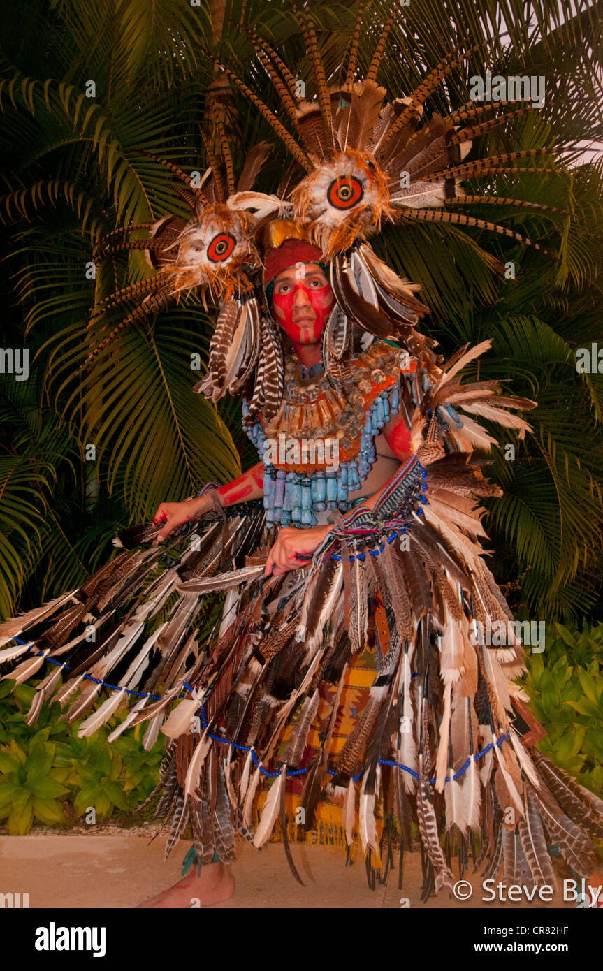 A Mayan fokllore ritual is performed by a maya performer in traditional ...