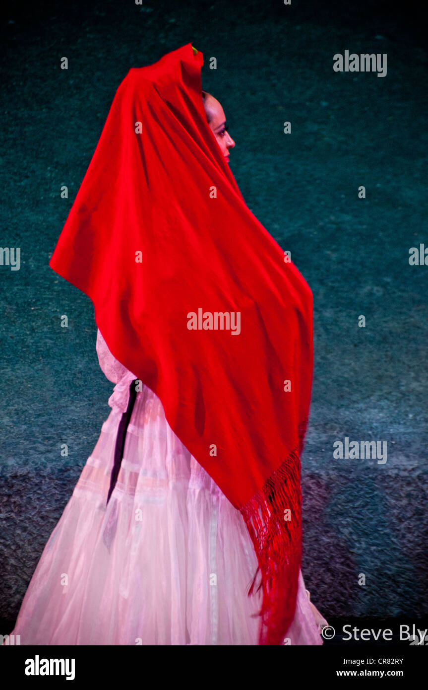 Beautiful Maya dancer in traditional dress performing a folklore dance ...