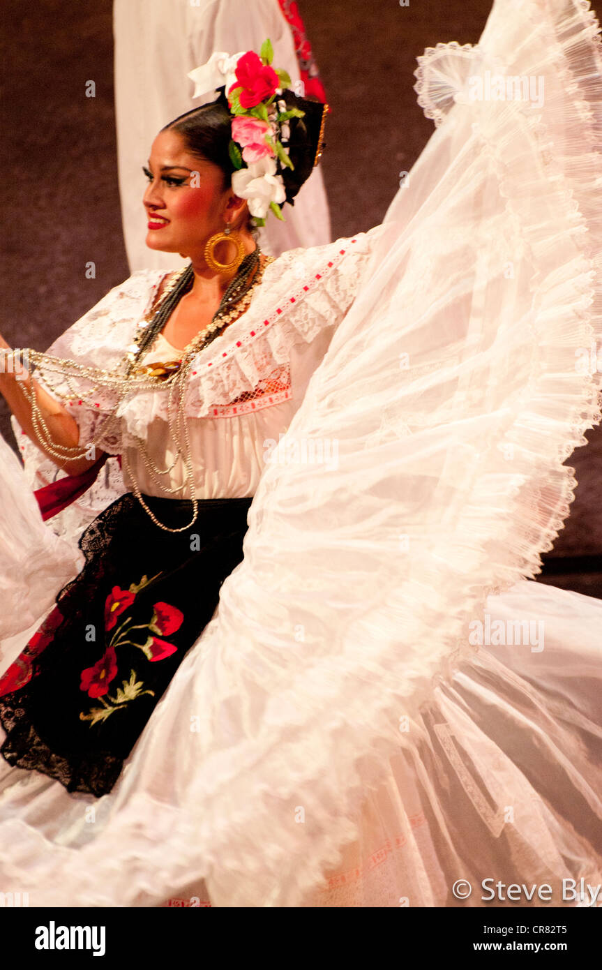 Beautiful Maya dancer in traditional dress performing a folklore dance ...