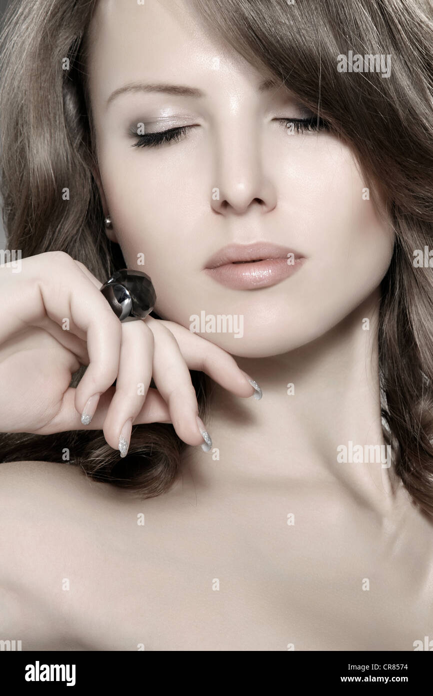 Young woman wearing a ring, beauty shot, portrait Stock Photo - Alamy