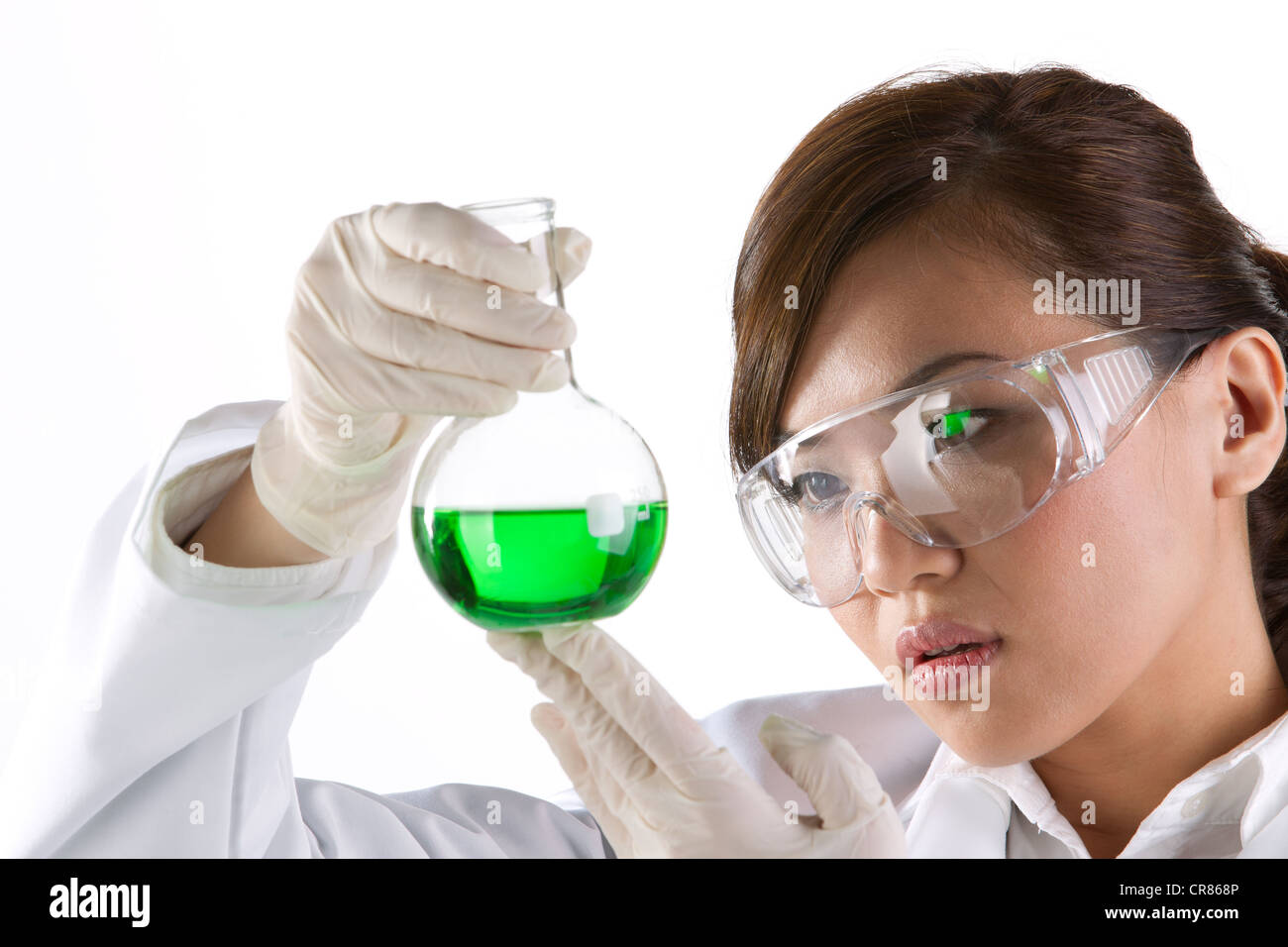 Portrait of a scientist analyzing a solution Stock Photo - Alamy