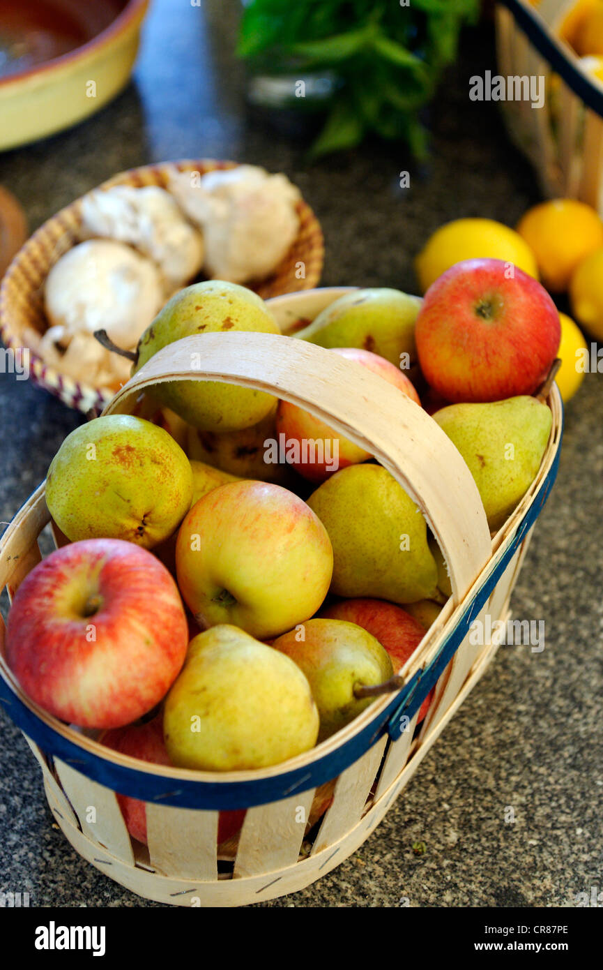 France, Gard, Barjac, Mas Escombelle, fruit basket full of apples Stock ...