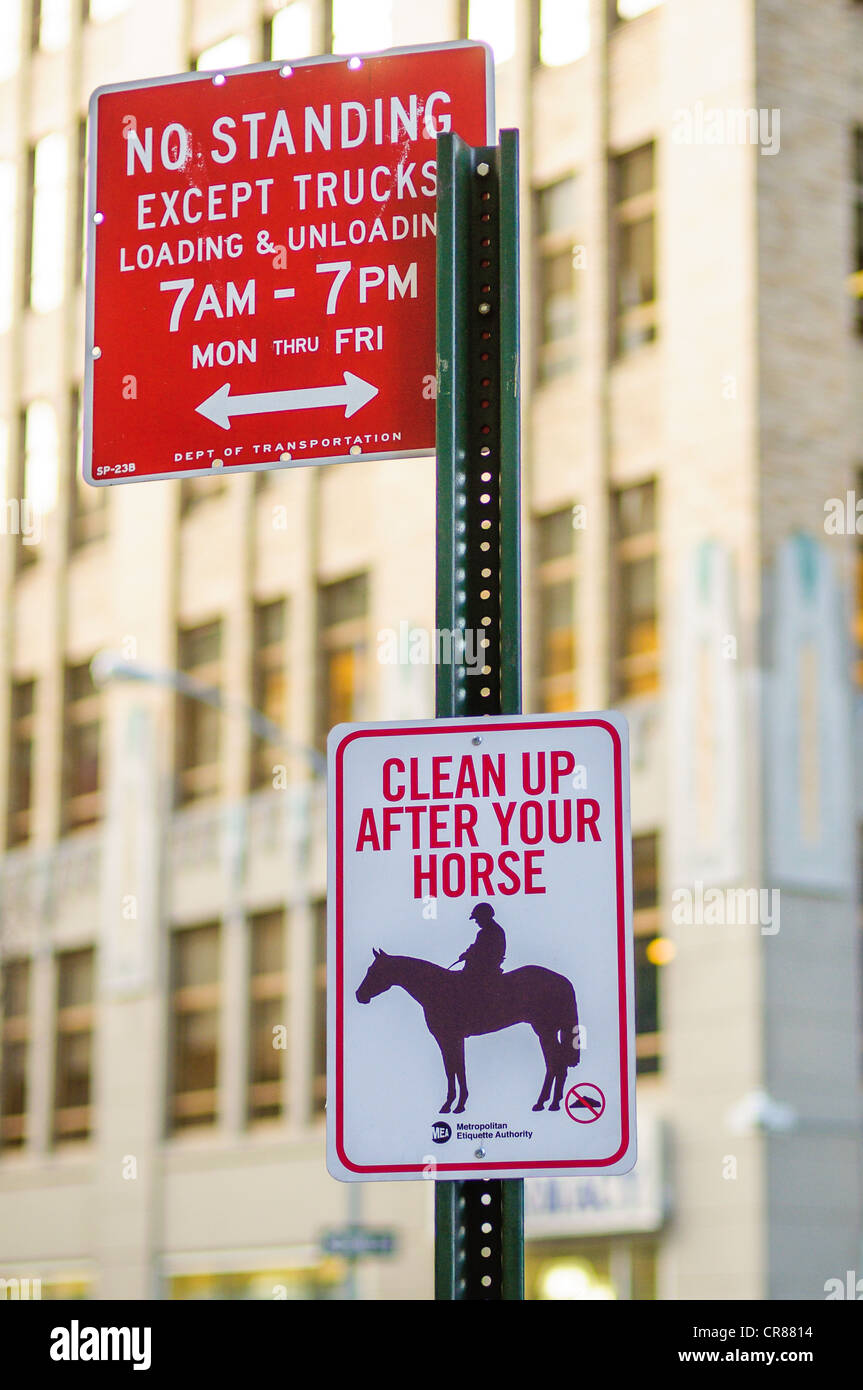 A sign mimicking a NYC traffic sign instructing horse-riding police ...