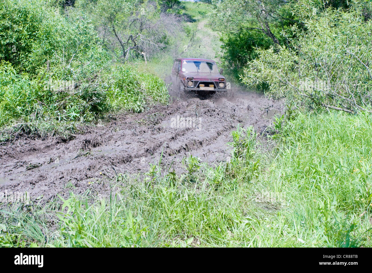 off-road driving on dirt. spray of dirt Stock Photo - Alamy