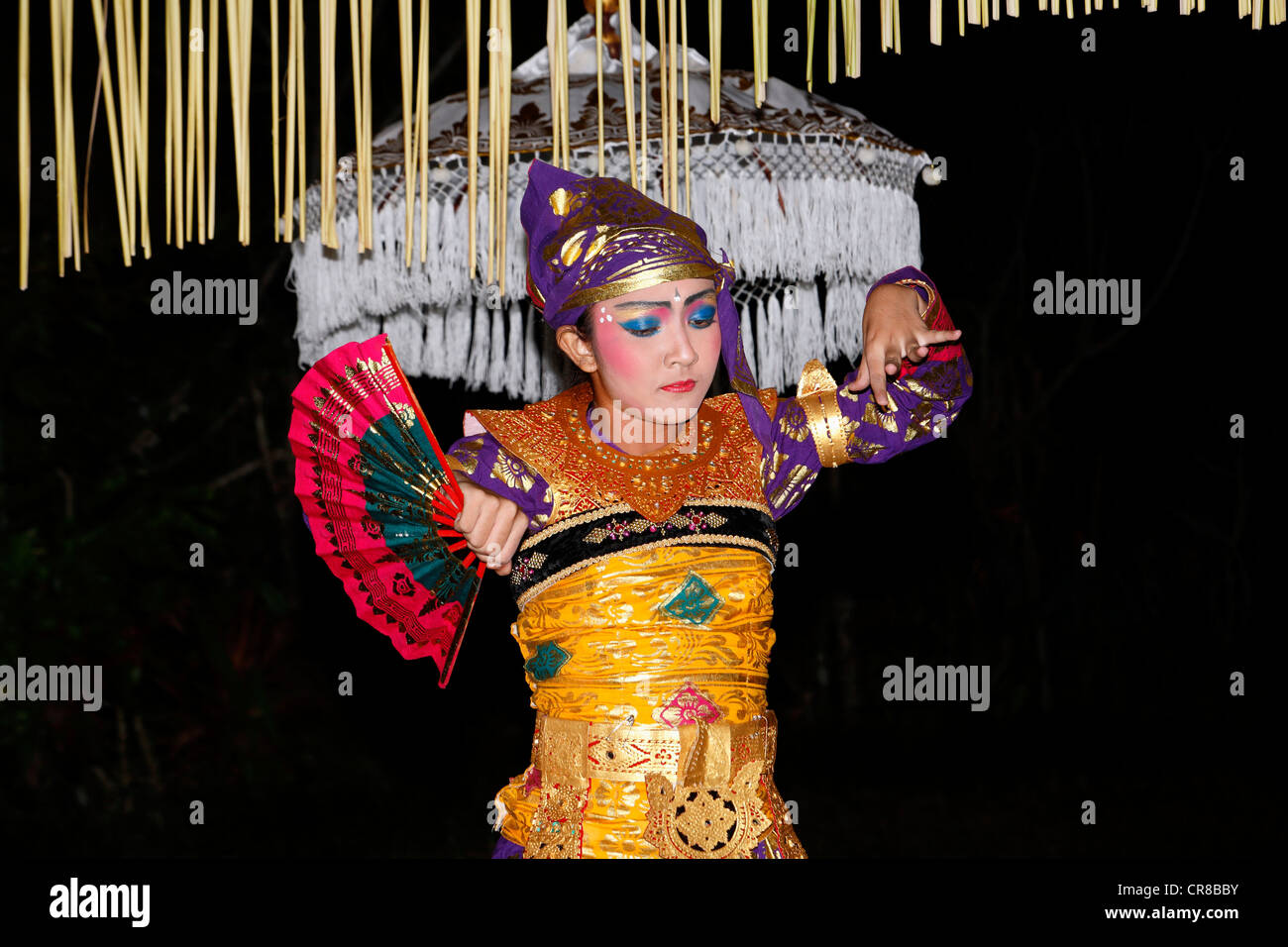 Balinese female dancer performing the Teruna Jaya, which depicts ...