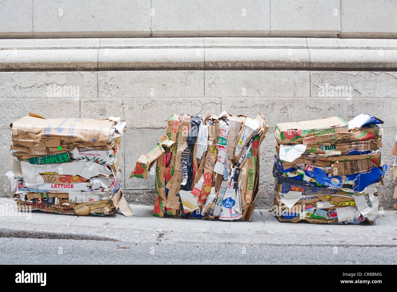 Compacted cardboard for recycling Stock Photo - Alamy