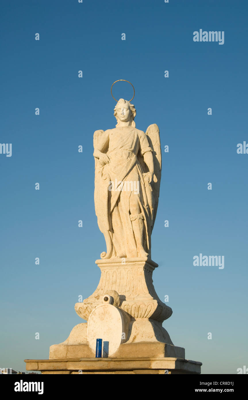 Statue of Arch Angel San Rafael on the first century Roman bridge over ...
