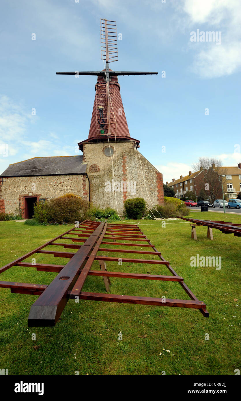 Men hard at work putting new sweeps onto Blatchington Mill Windmill in ...