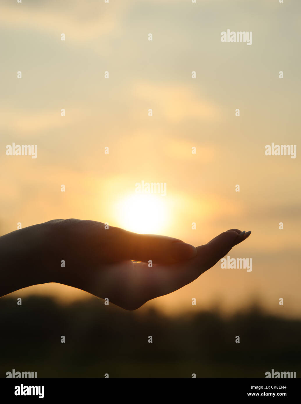 The sunset in hand. Abstract photography in backlit Stock Photo - Alamy