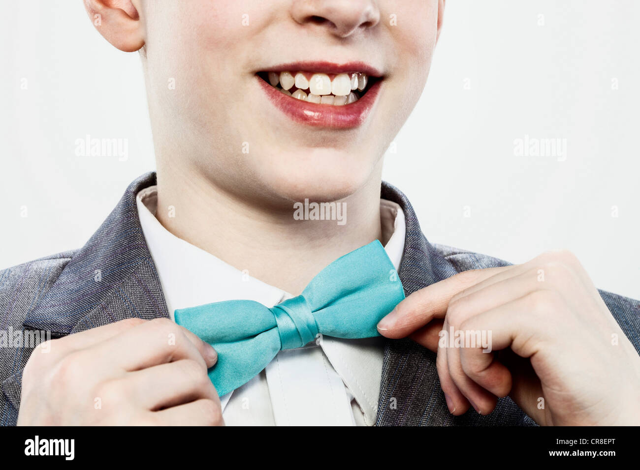 Boy with bow hi-res stock photography and images - Alamy