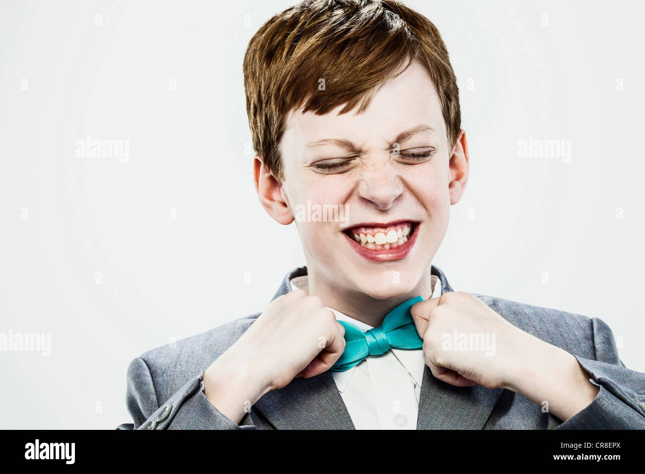 Boy with bow hi-res stock photography and images - Alamy