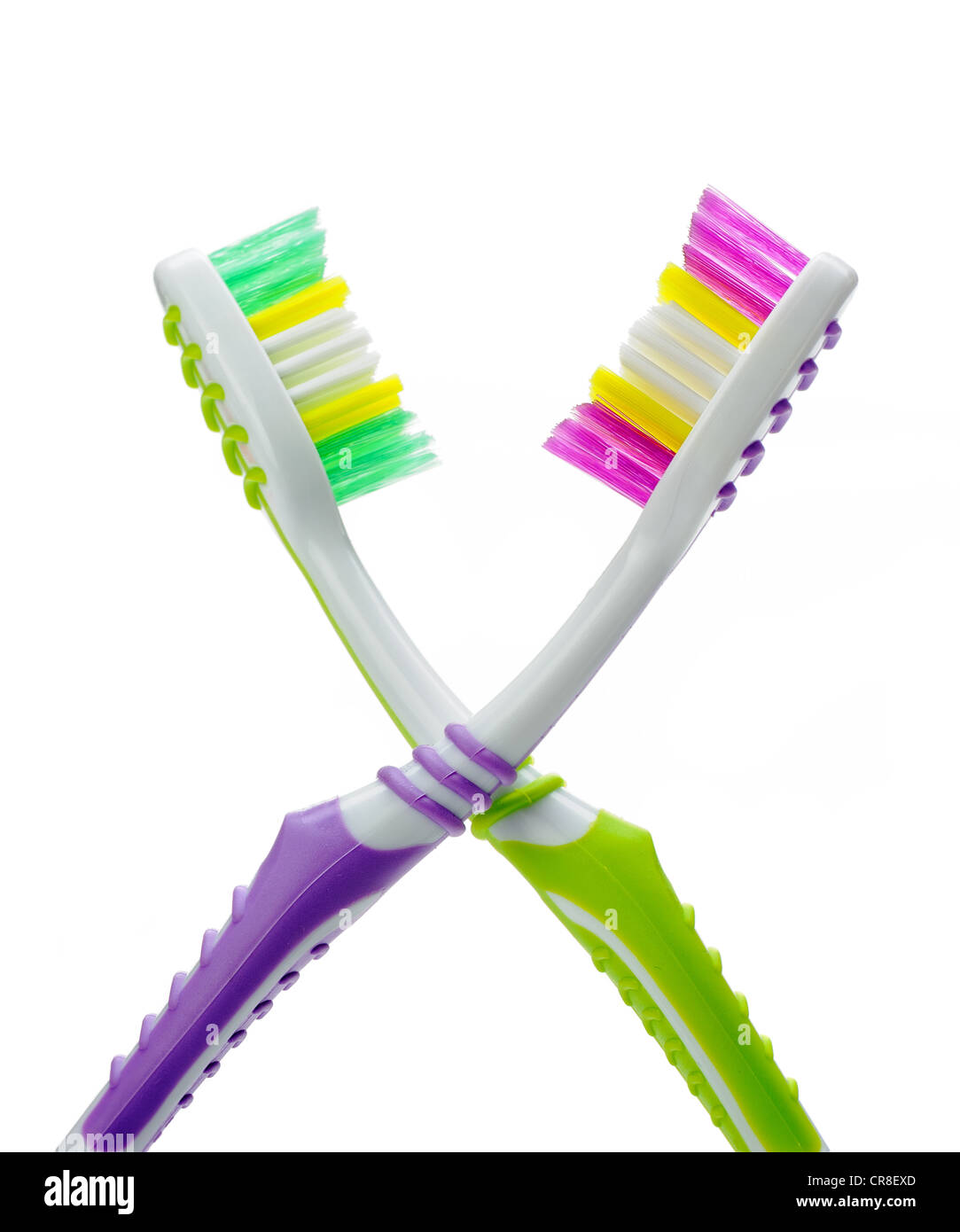 Two color toothbrushes . Photo closeup. Isolated on white background ...