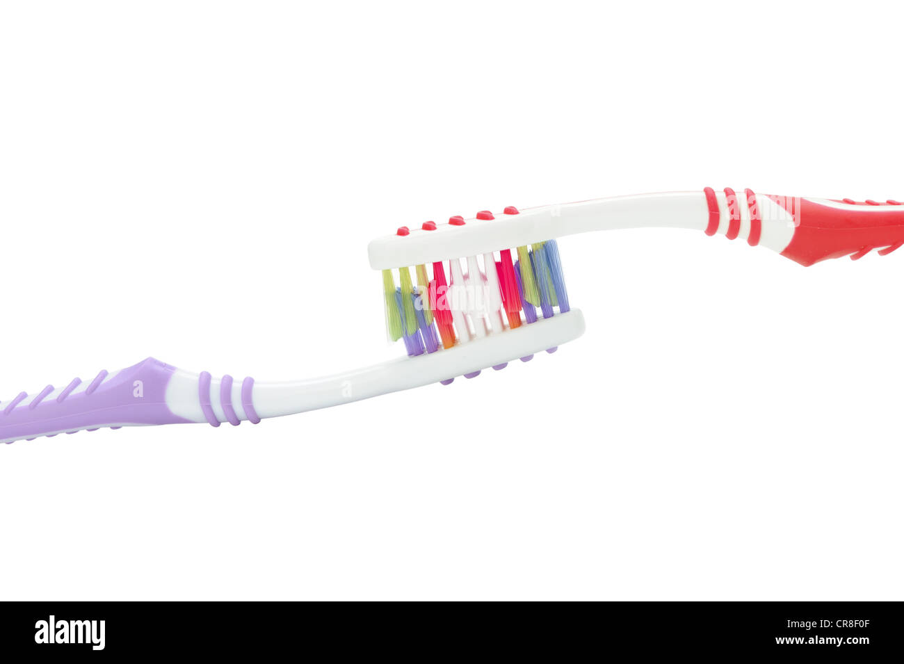Two color toothbrushes . Photo closeup. Isolated on white background ...