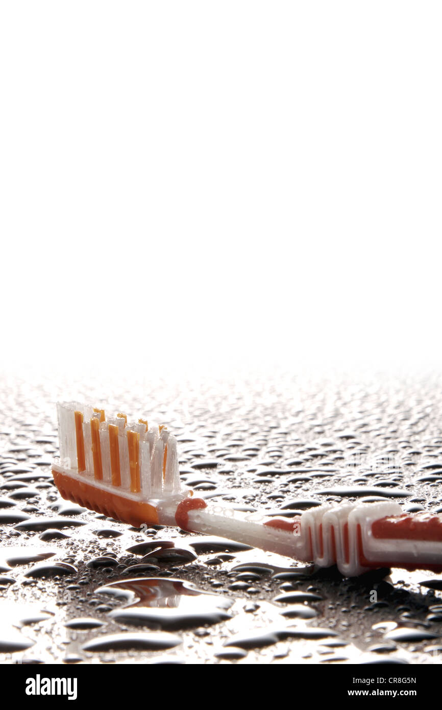 Toothbrush with water drops Stock Photo - Alamy