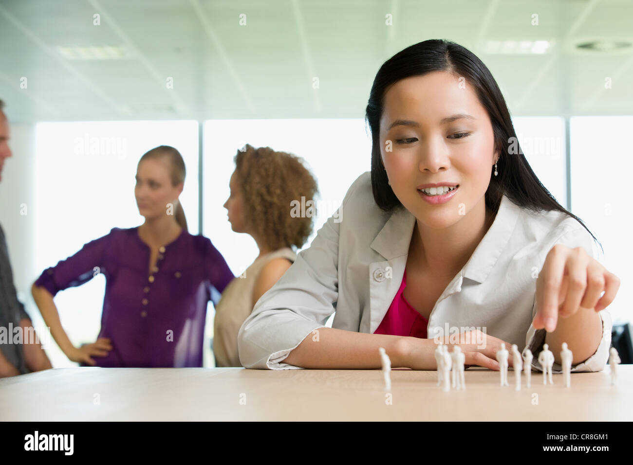 Front working figures hi-res stock photography and images - Alamy