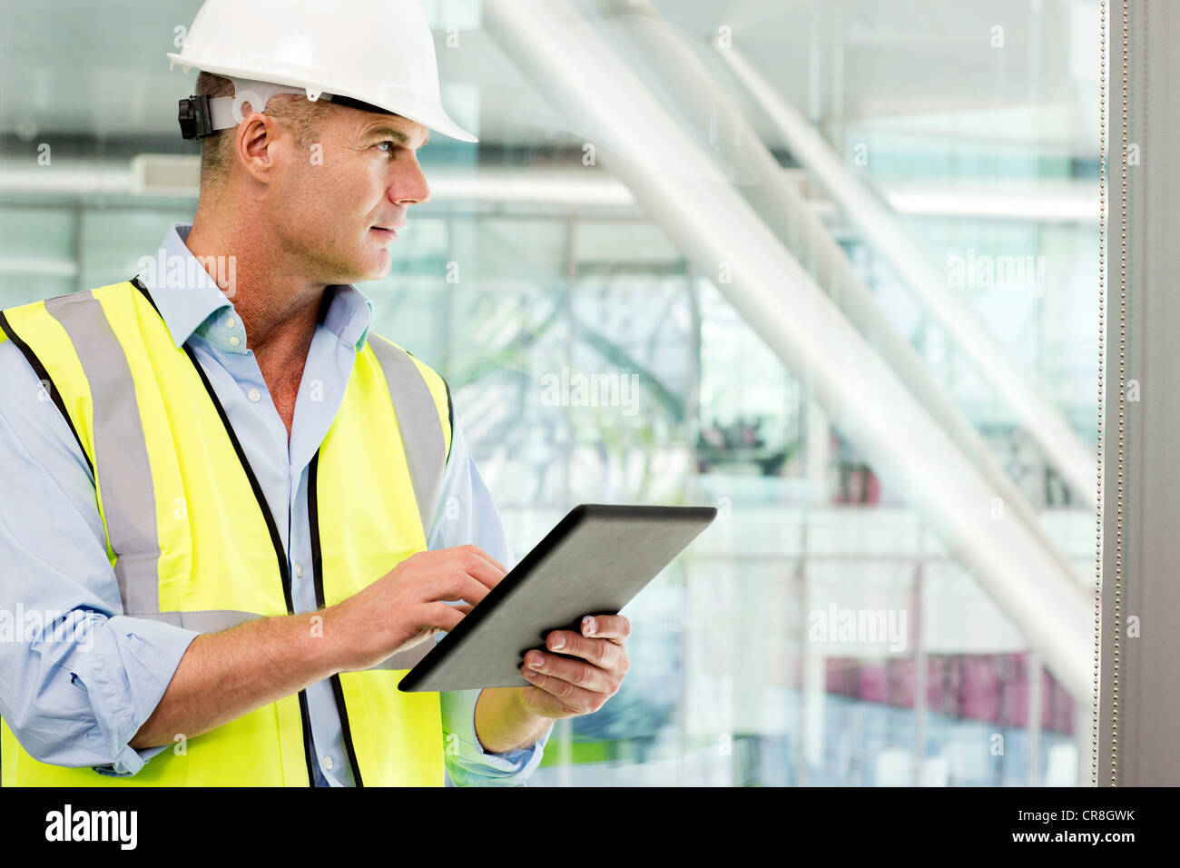 Engineer digital tablet stands hi-res stock photography and images - Alamy