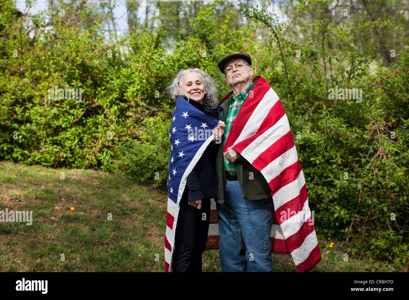 Couple wearing white with american flag hi-res stock photography and ...