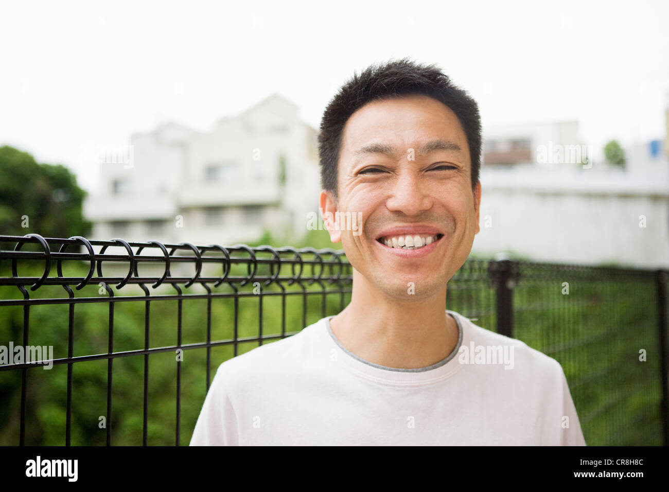 Portrait of a happy man outdoors Stock Photo - Alamy