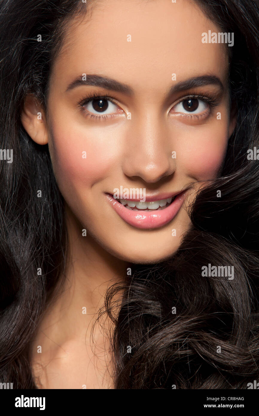 Young woman smiling, close up Stock Photo - Alamy