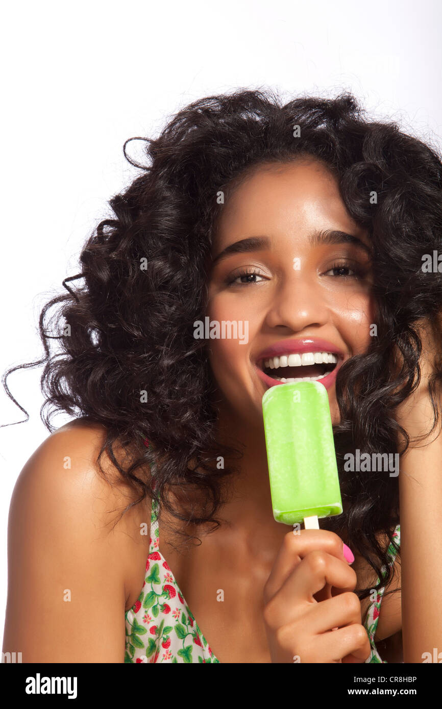 Woman Eating Popsicle