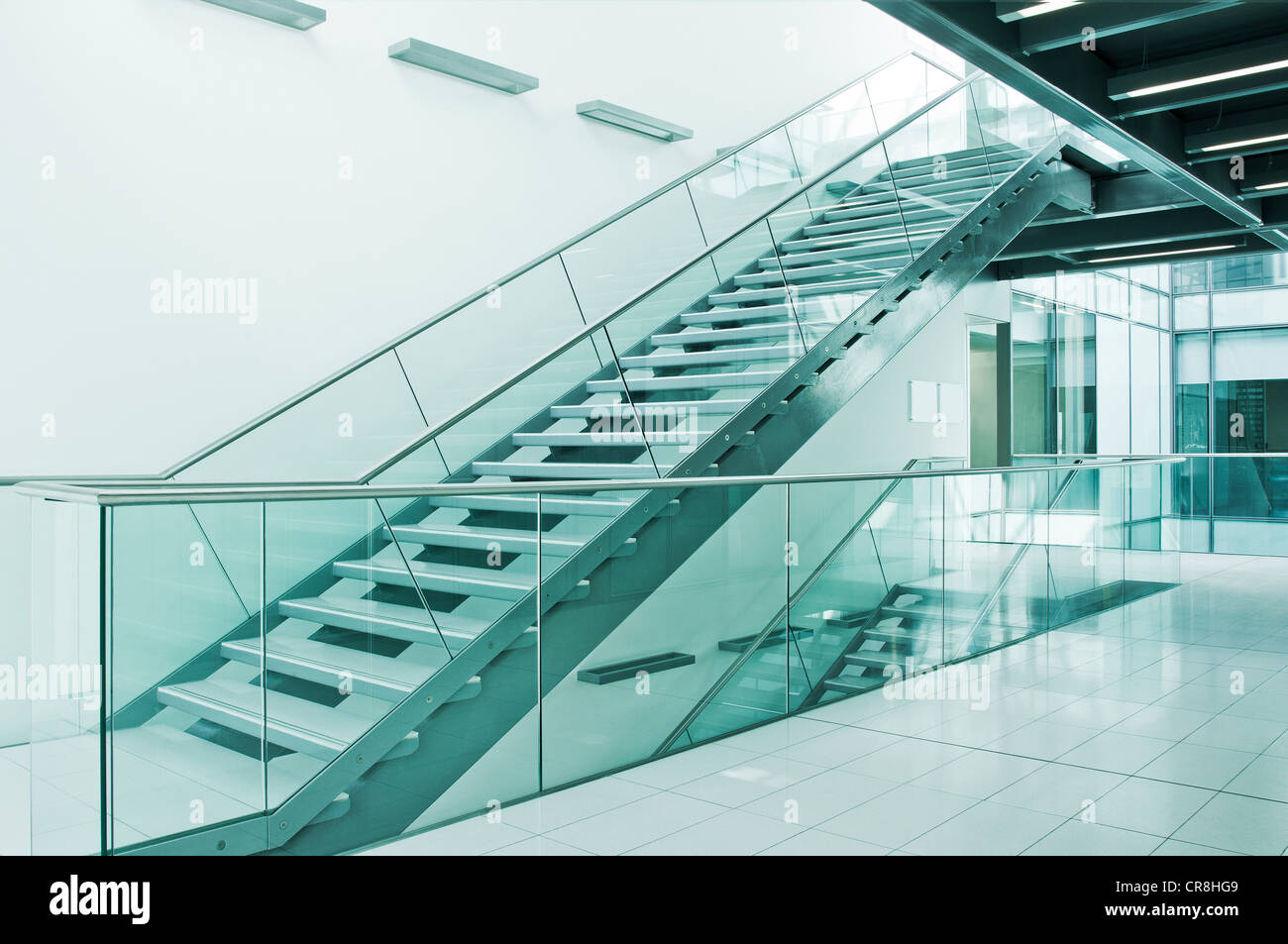 Staircase in empty office block Stock Photo - Alamy