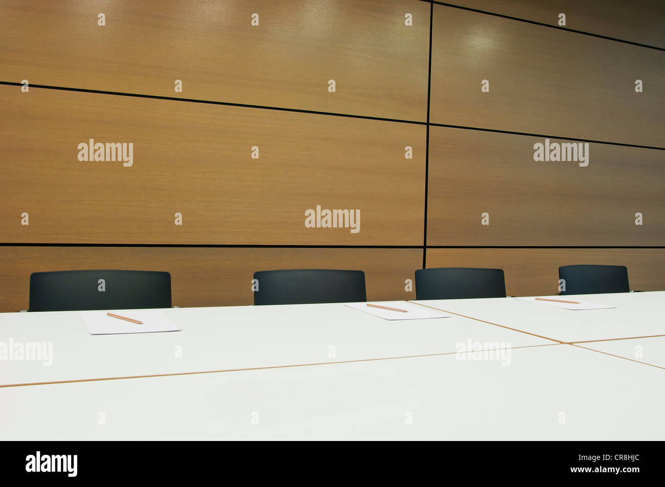 Conference table in empty office block Stock Photo - Alamy