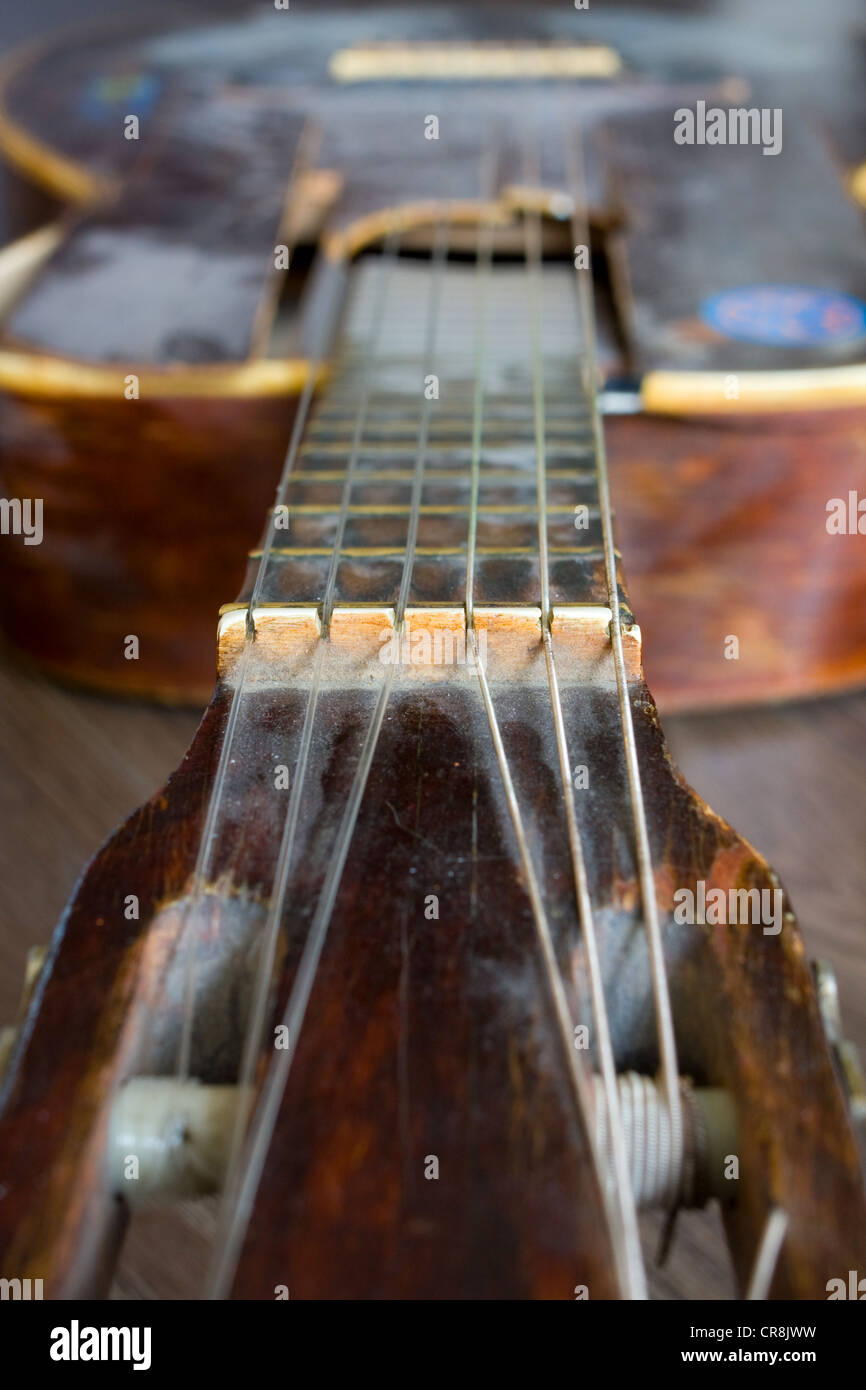 old and destroyed guitar Stock Photo - Alamy