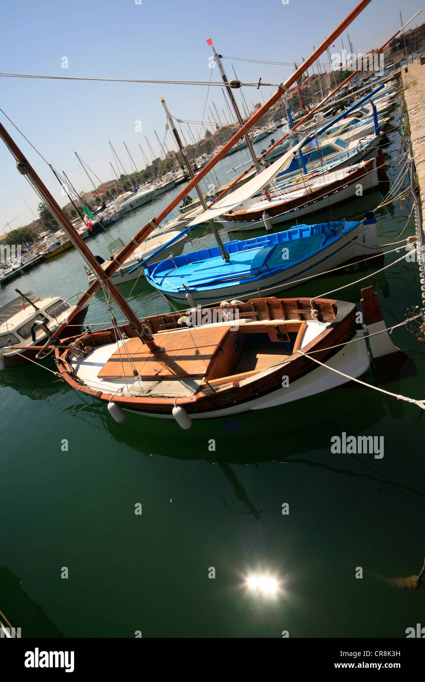 Small wooden fishing boats in Alghero Sardinia Italy Stock Photo - Alamy