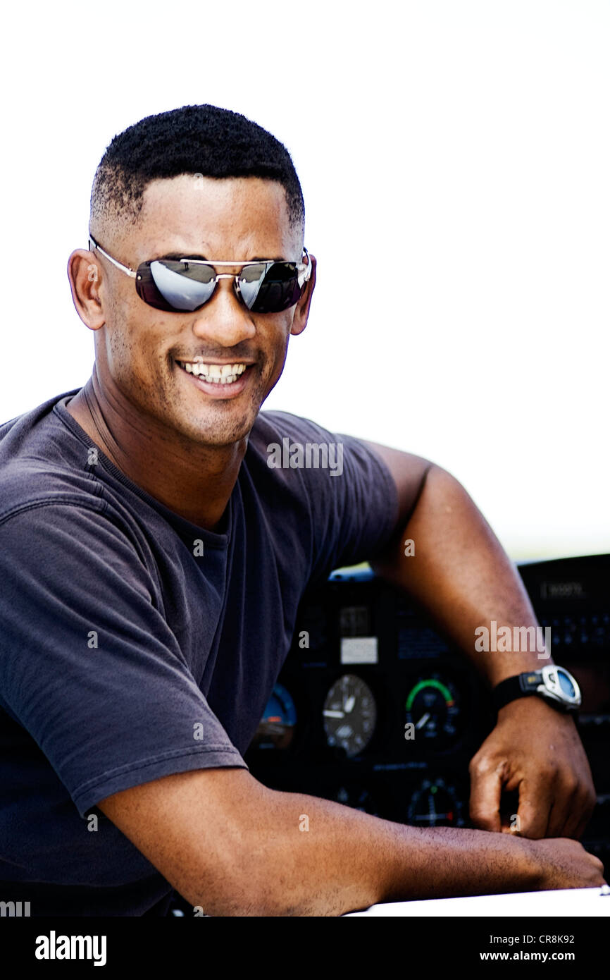 African american pilot checking hi-res stock photography and images - Alamy