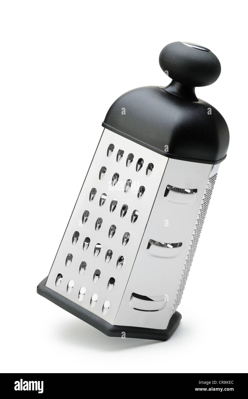 Iron grater, a device which grates food . Isolated on white background ...