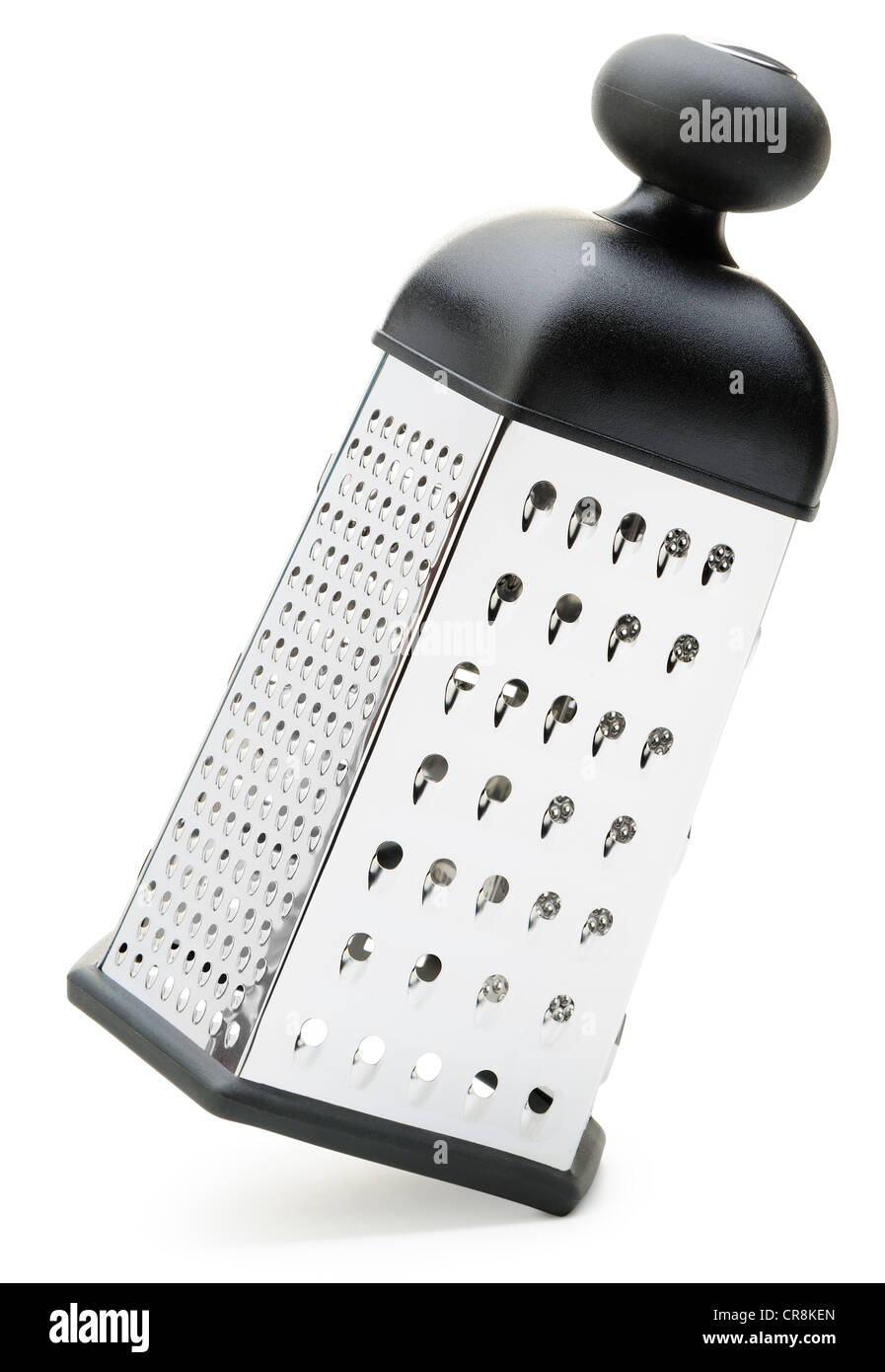Iron grater, a device which grates food . Isolated on white background ...