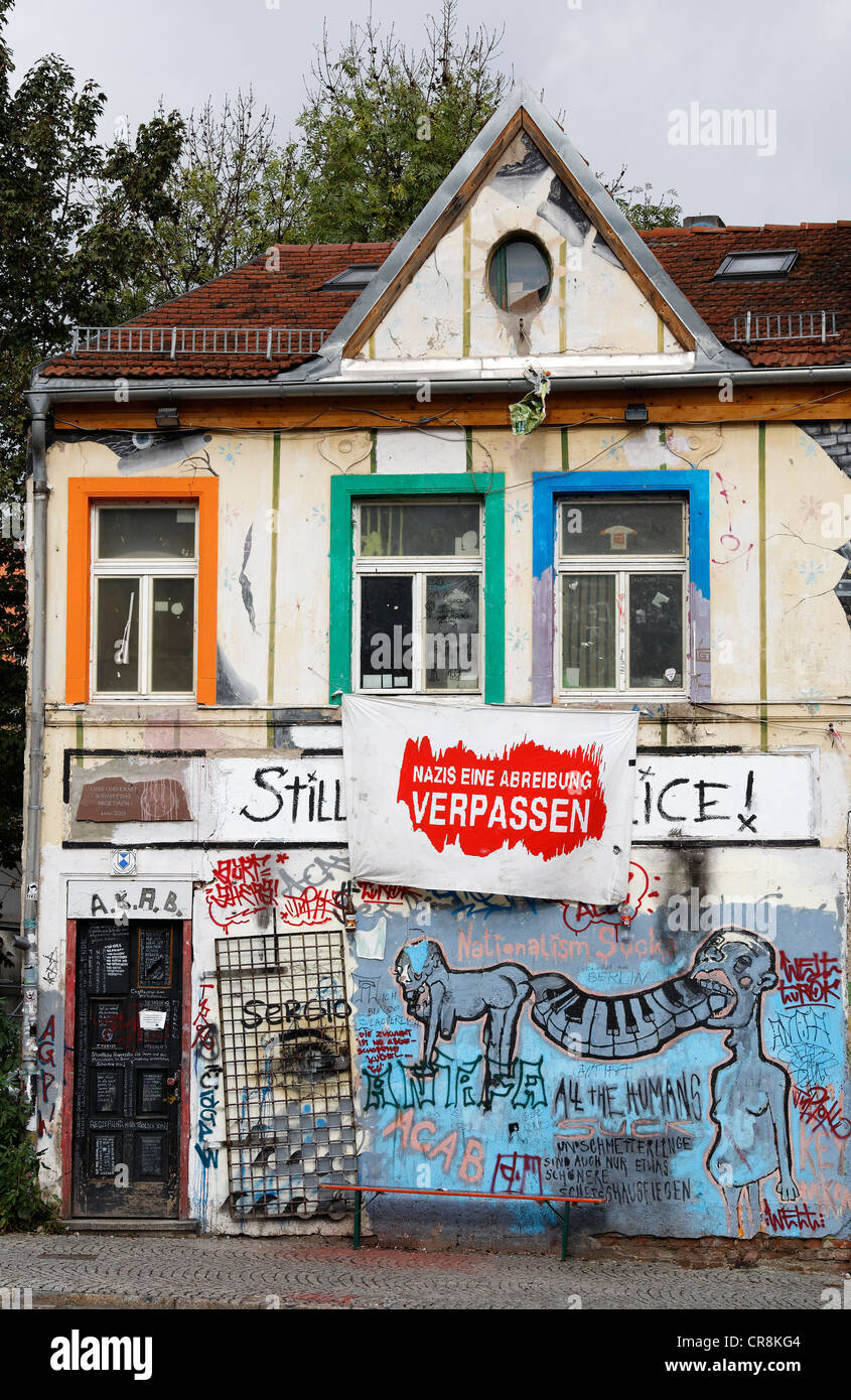 Condemned buildings in the historic district, painted with graffiti and ...
