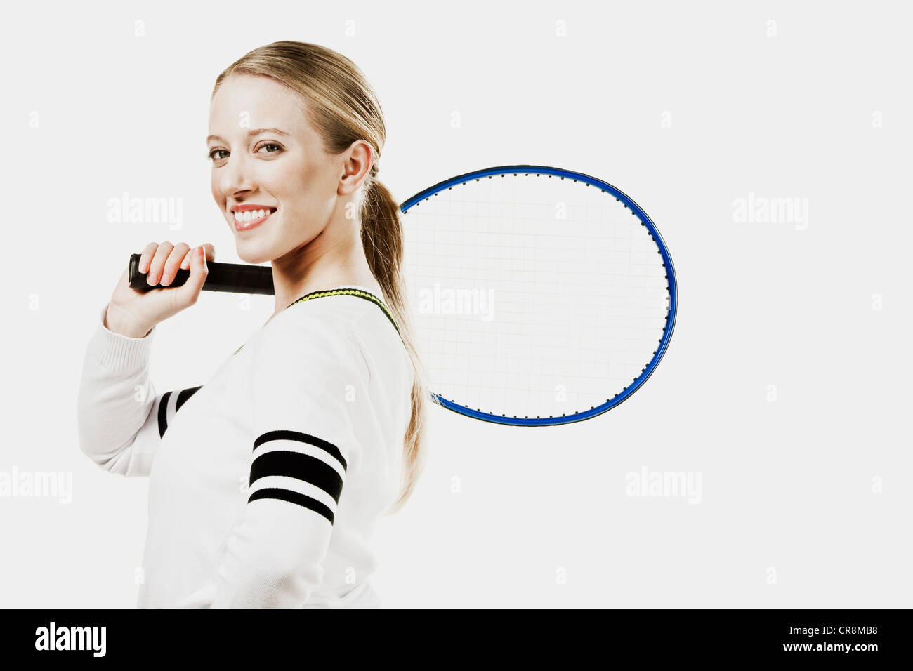 Tennis player holding tennis racket Stock Photo - Alamy