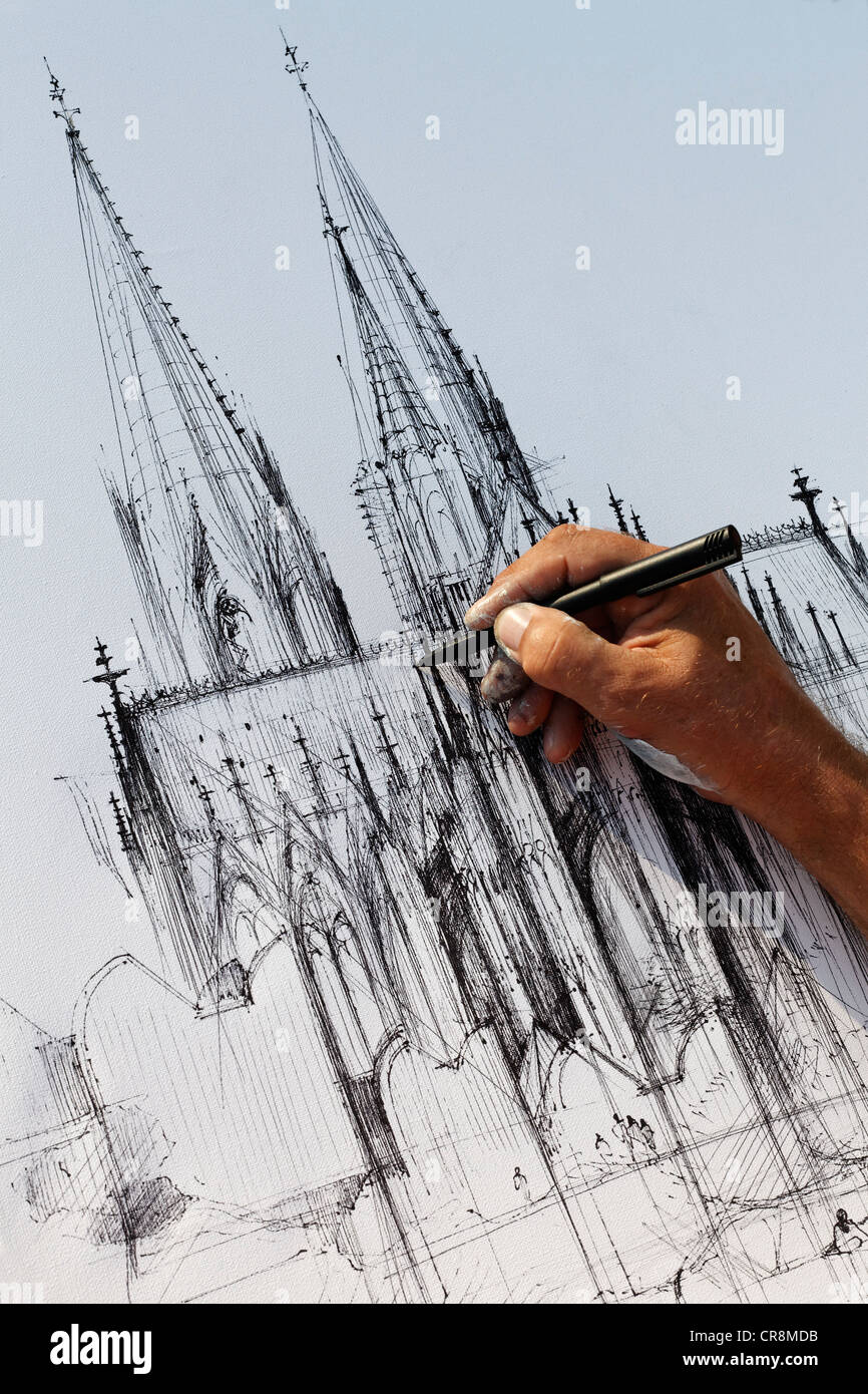 Hands of a street artist drawing the Cologne Cathedral, Cologne, North ...