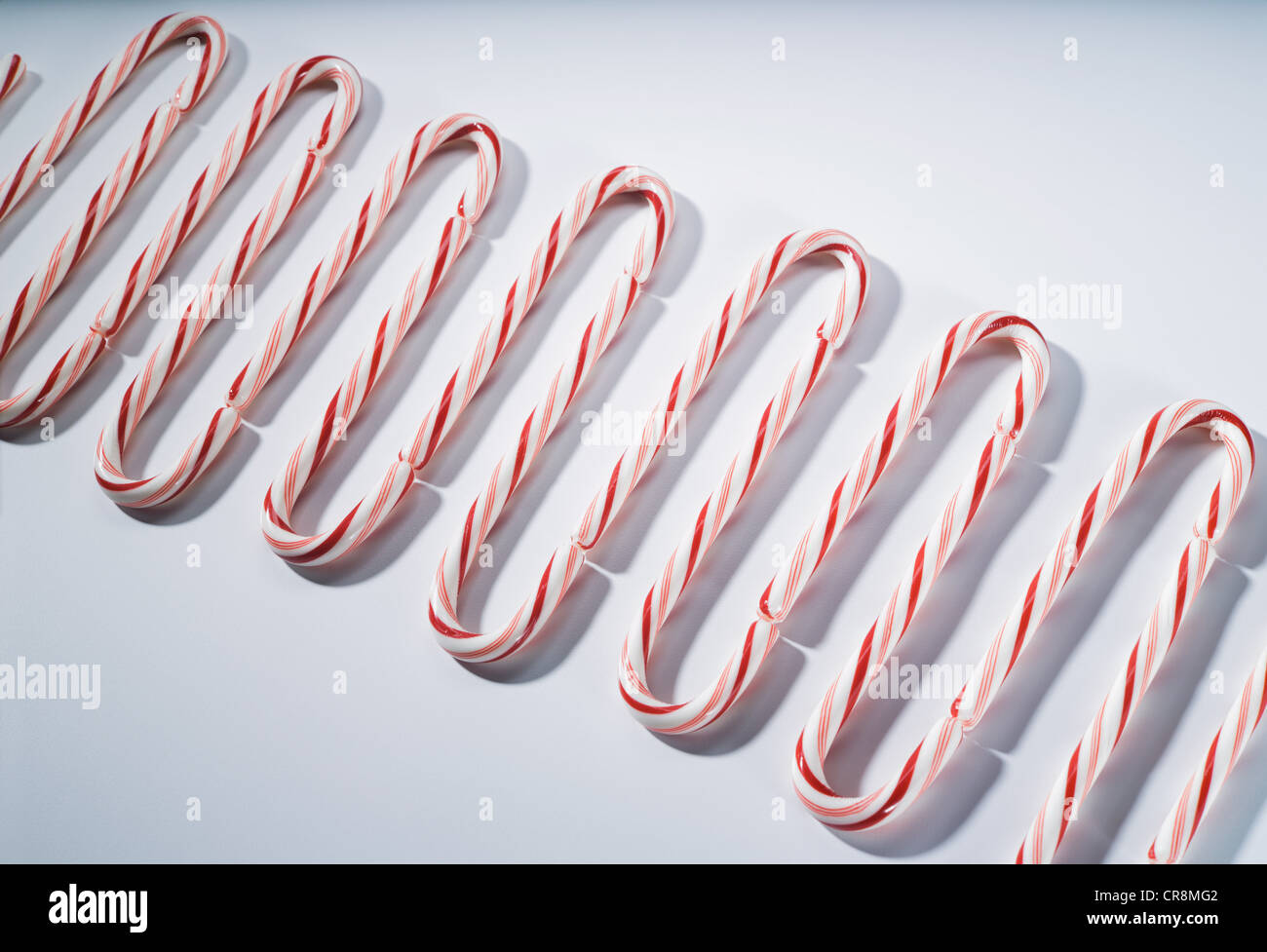 Candy canes in a row Stock Photo - Alamy