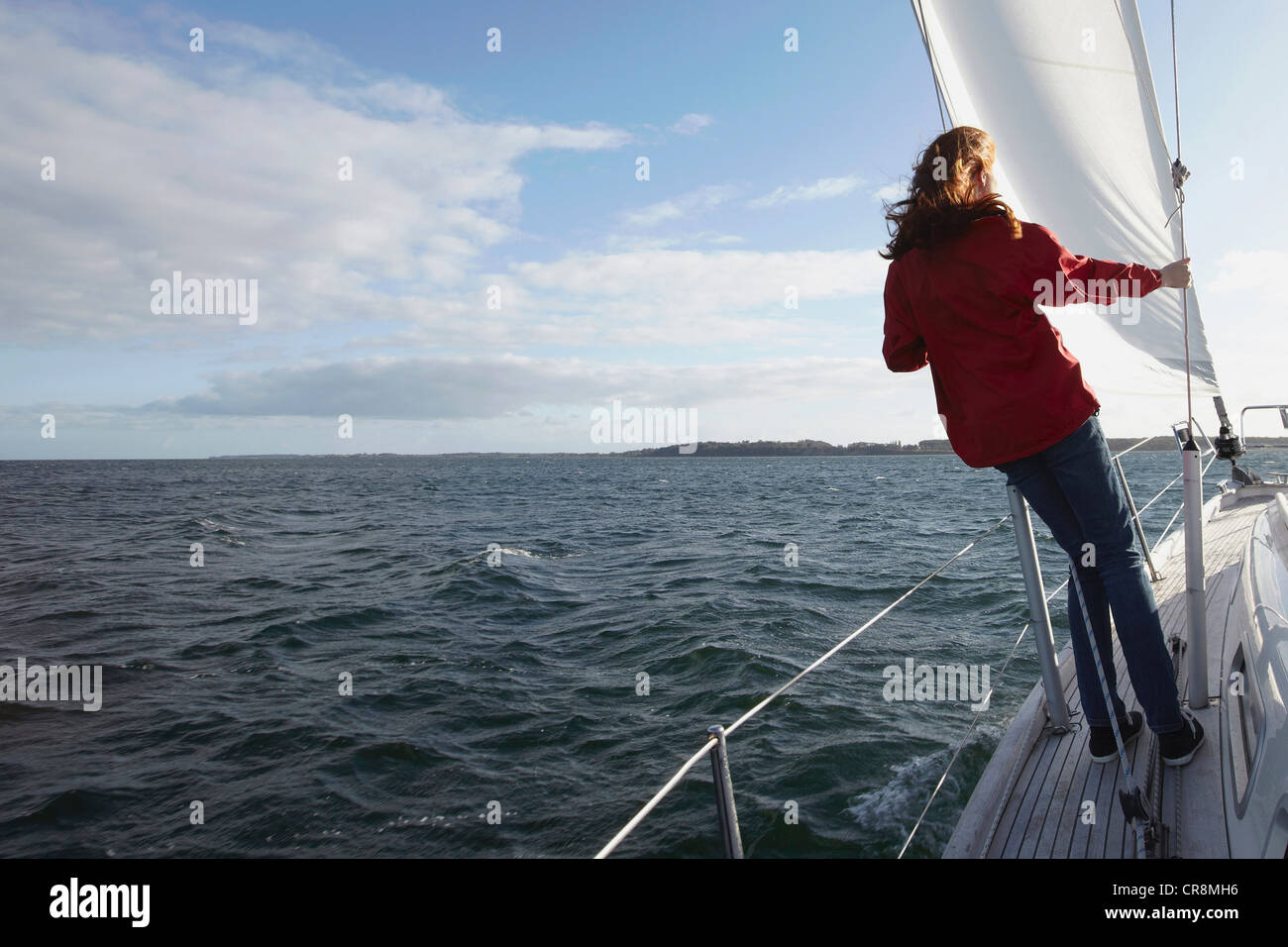 Woman sailing on yacht, rear view Stock Photo - Alamy