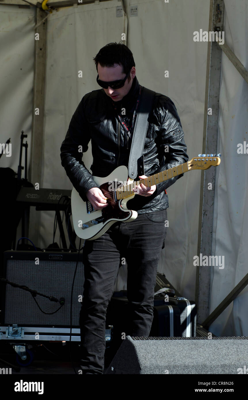 Chris Simpson, guitarist with local group the Asps, performing during ...
