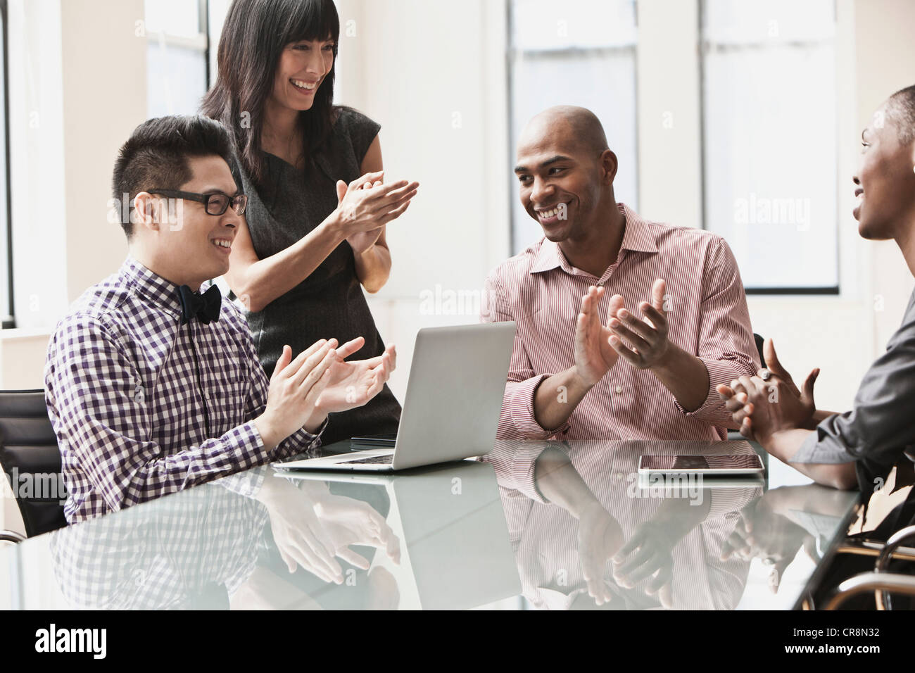 Chinese businesspeople clapping congratulating hi-res stock photography ...