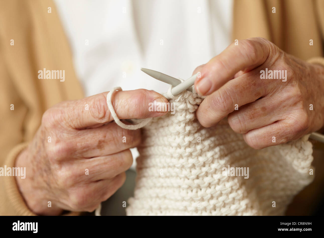 Senior woman knitting, close up Stock Photo - Alamy