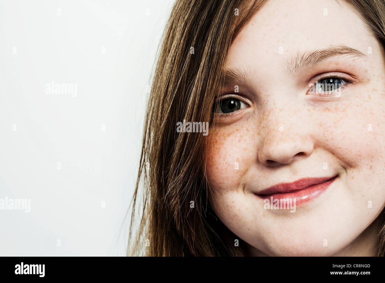 Girl looking at camera Stock Photo - Alamy