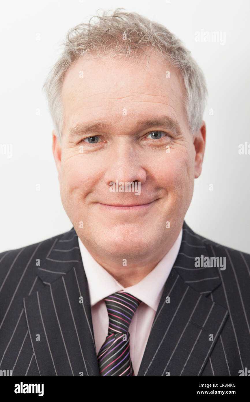 Businessman smiling, portrait Stock Photo - Alamy