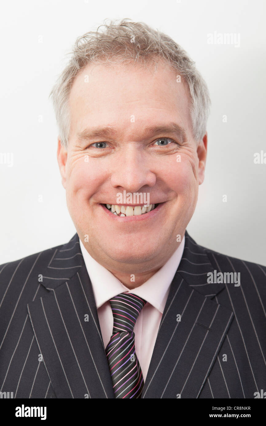 Smart smiling suit head shot headshot portrait hi-res stock photography ...