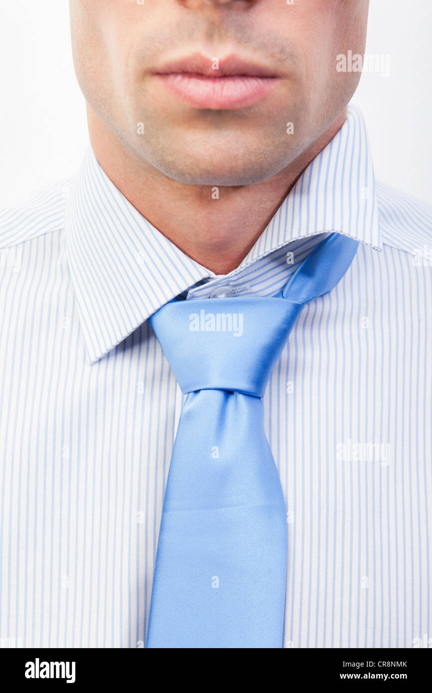 Young man with messy shirt and tie Stock Photo - Alamy