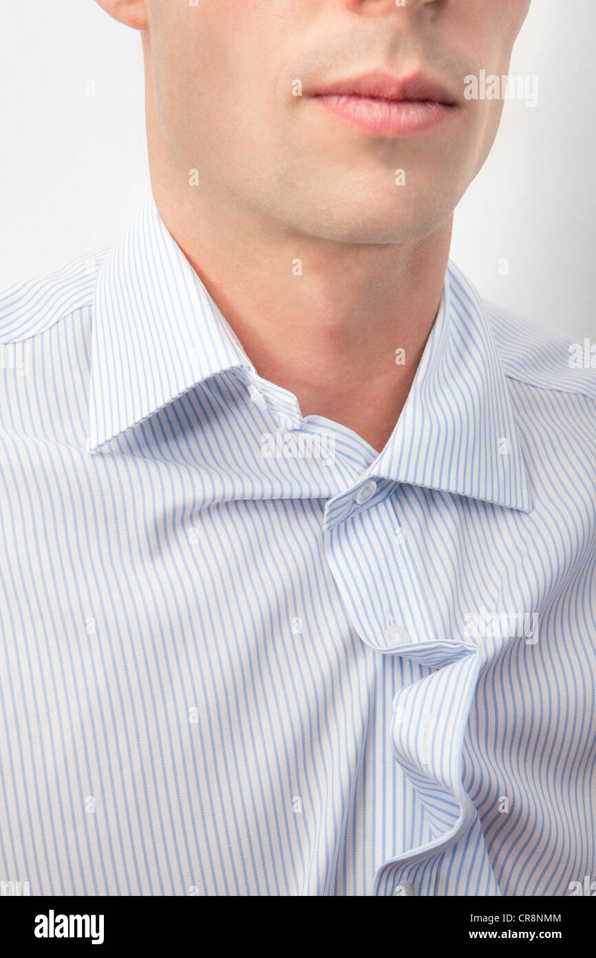 Young man with messy shirt Stock Photo - Alamy
