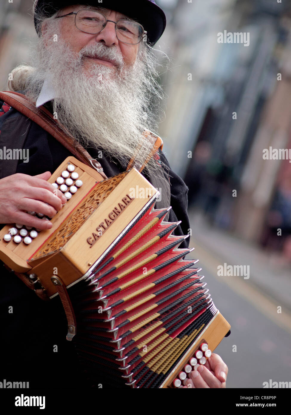 An accordion player at a Morris dancing festival Stock Photo - Alamy