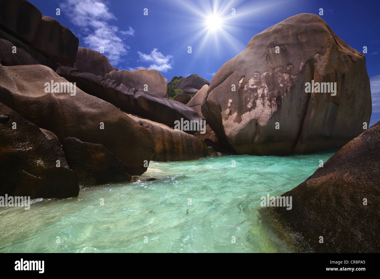 Giant rocks rolled down to the oceans shore worn smooth from eons of ...