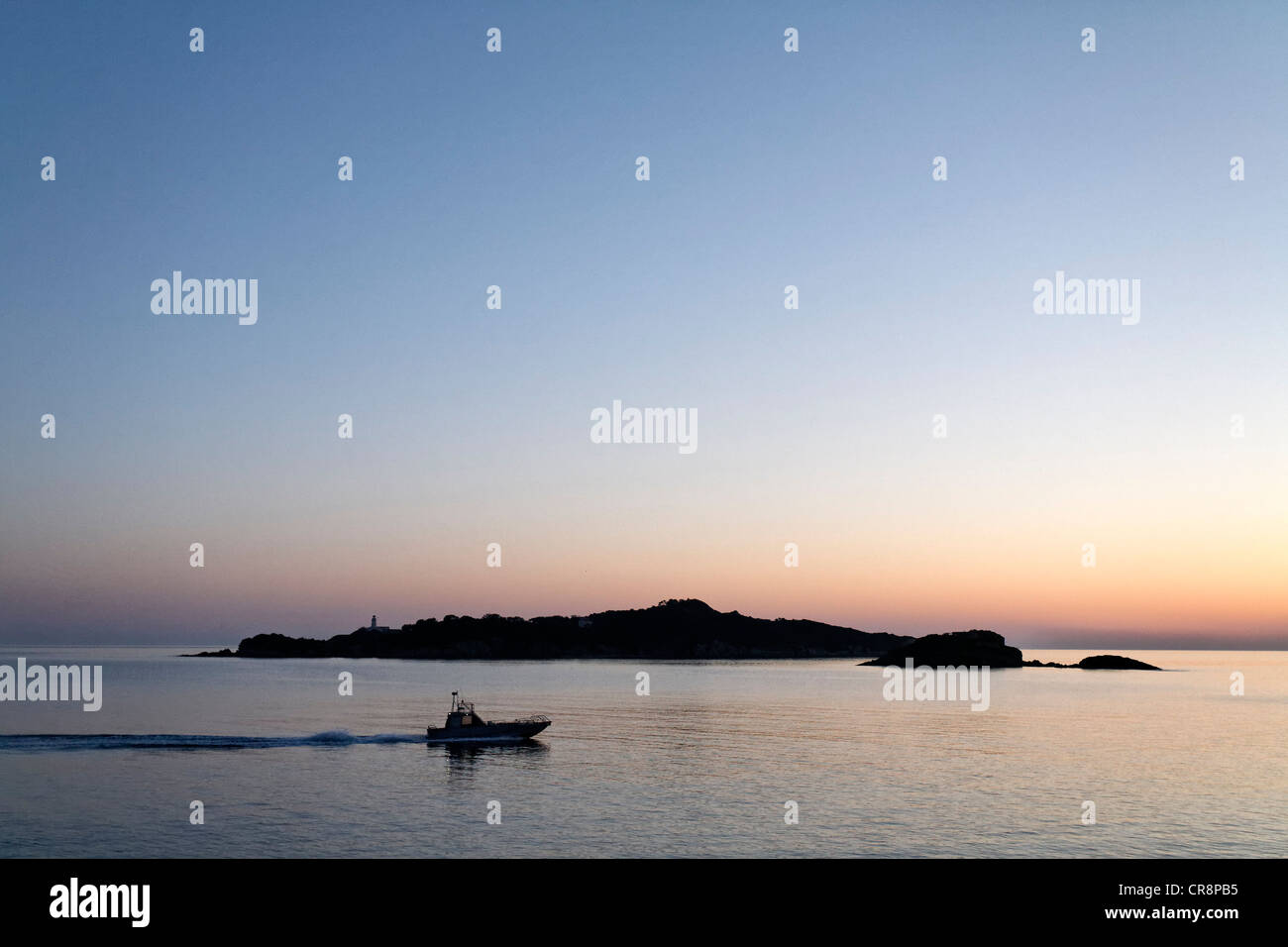 Small boat off a small island, evening mood, Iles d'Hyeres islands ...