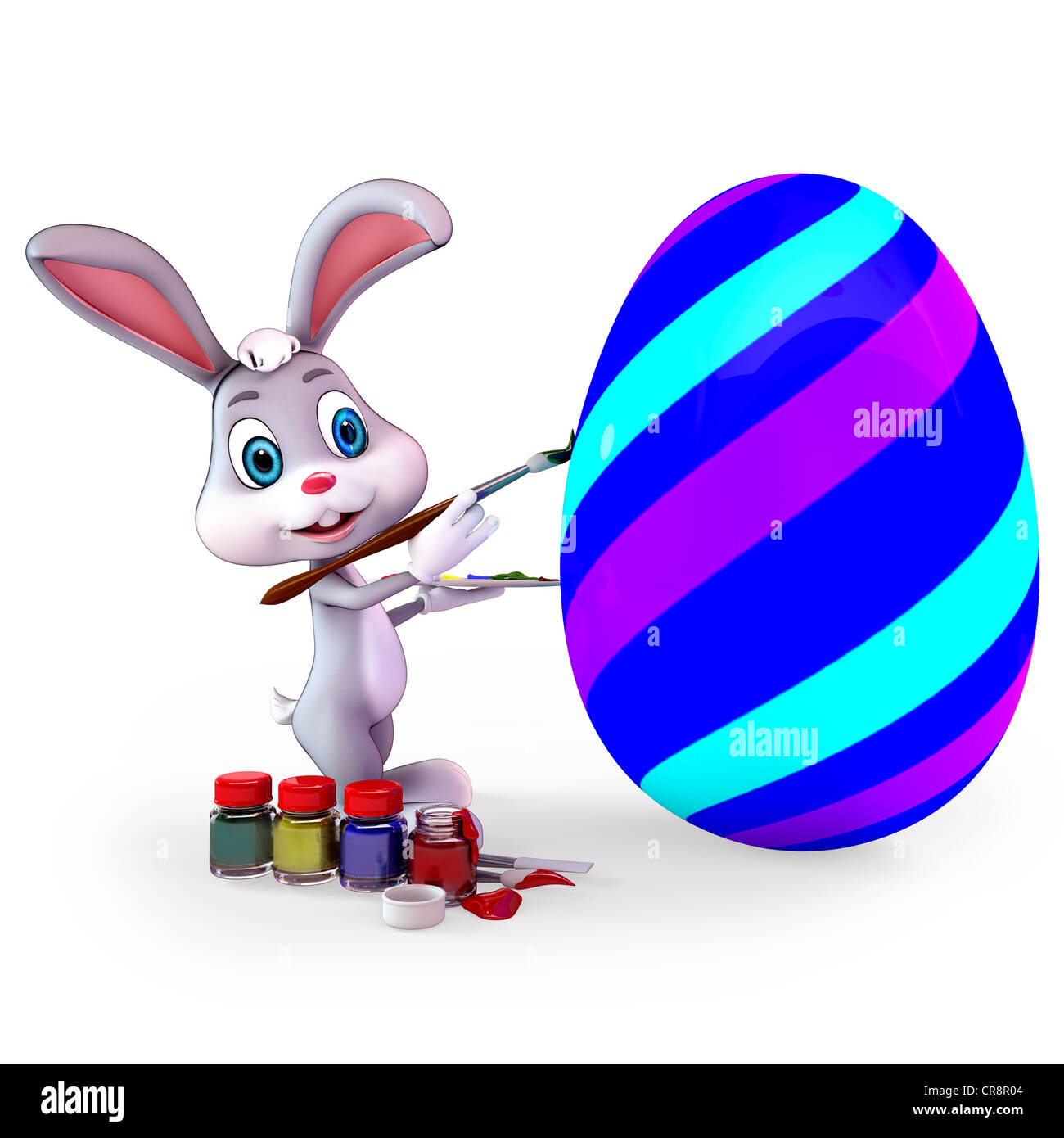 bunny painting egg with blue Stock Photo - Alamy