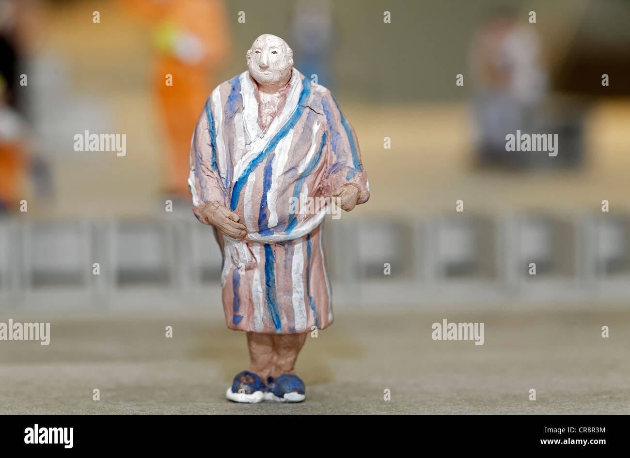 Fat man wearing a bathrobe, small, painted figure, exhibition of ...